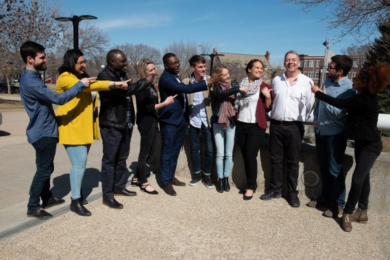 Daniel surrounded by the spring 2018 cohort.