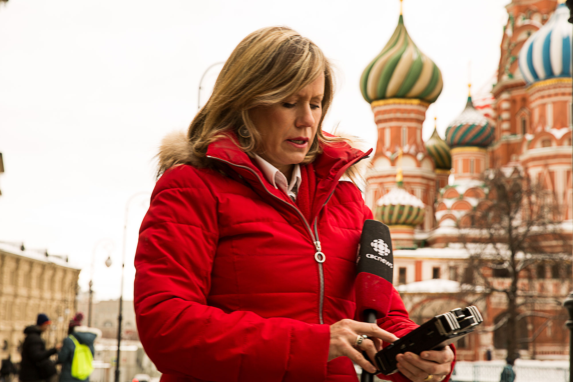 Correspondent Susan Ormiston adjusts her recording device in front of ...
