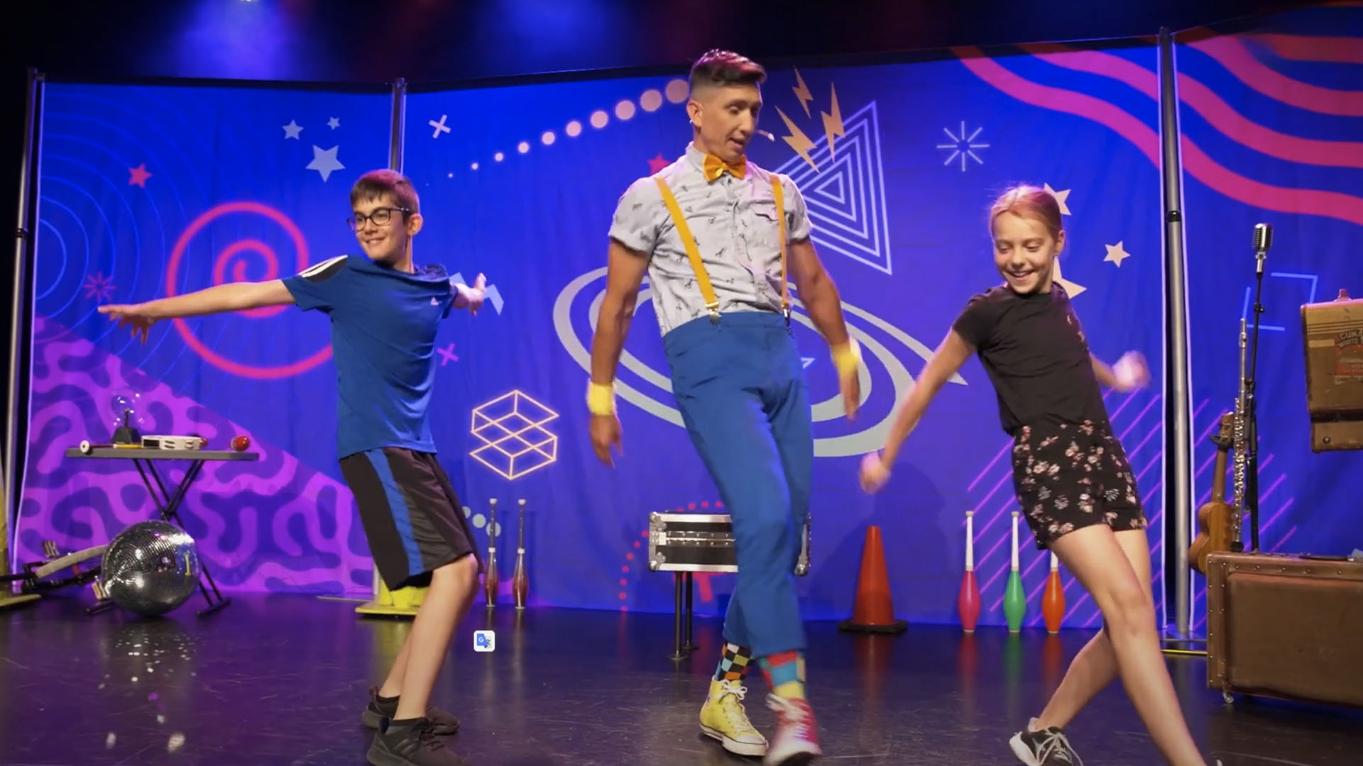 Zak, the main character of the show, is dancing with two kids from the ...