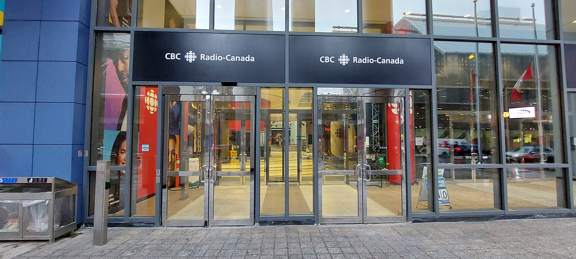 The main entrance on Front Street has a set of doors that can be opened ...