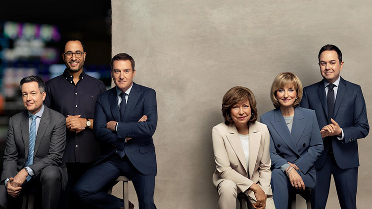 A diverse group of Radio-Canada journalists and news anchors stand ...